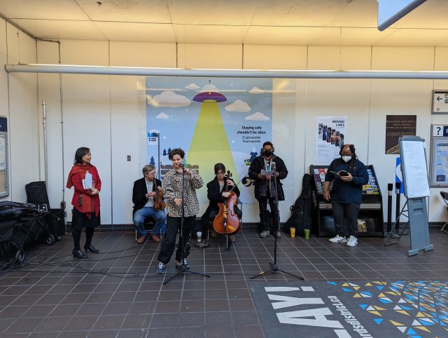 Poets and musicians captivate commuters at pop-up poetry reading - The ...
